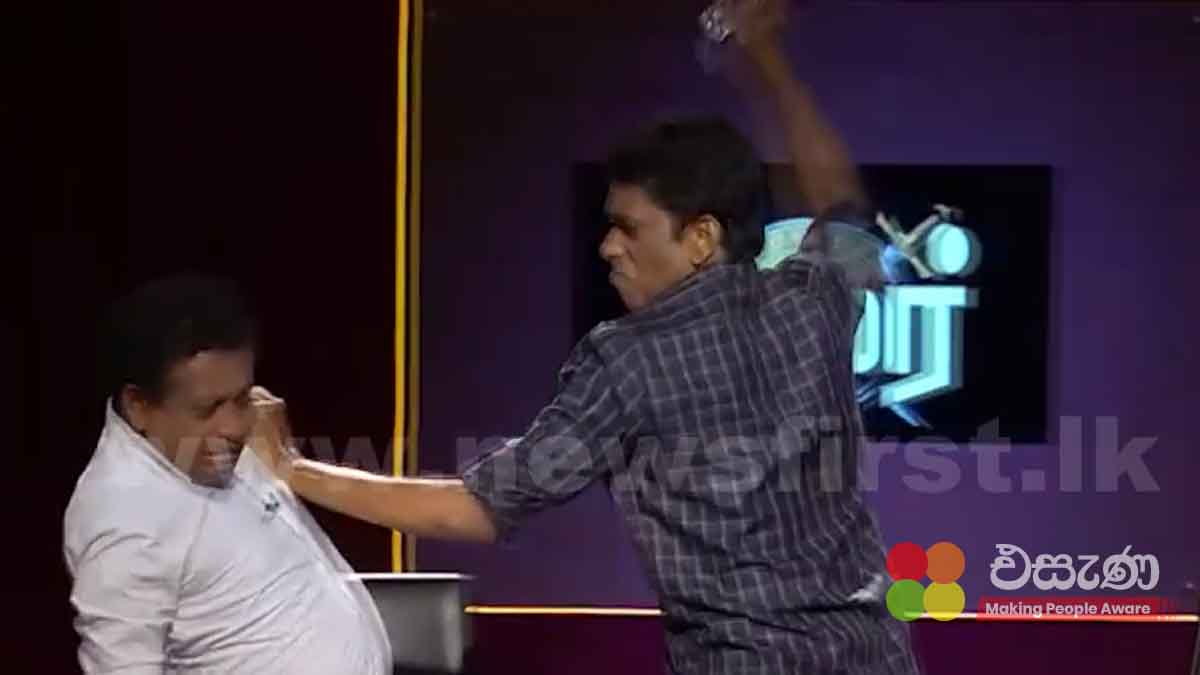 රූපවාහිනී වැඩසටහනකදී දිගම්බරන් සහ වේලුකුමාර් ගුටිබැට හුවමාරුවක